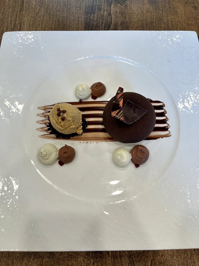 Dessert architecture that deserves its own museum exhibit. This chocolate masterpiece demonstrates why The Conche has earned its reputation as a temple of cocoa worship.