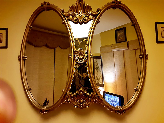 This ornate double mirror doesn't just reflect your face&mdash;it reflects your taste for the extraordinary. Victorian elegance meets funhouse charm.