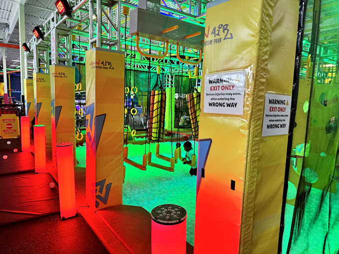 The multi-level adventure course turns "don't look down" into an impossible instruction. Thankfully, those safety harnesses aren't just for show! 