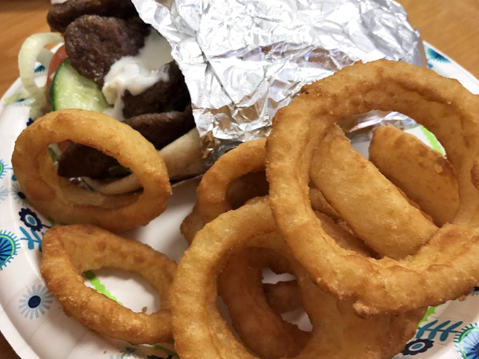 Onion rings that deserve their own zip code. Perfectly crisp, golden halos surrounding sweet onion centers&mdash;the kind that make you forget you once claimed to be "watching your carbs."