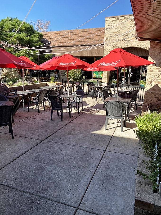The outdoor patio where summer dreams come true. Red umbrellas stand guard over tables waiting for your al fresco Italian adventure.