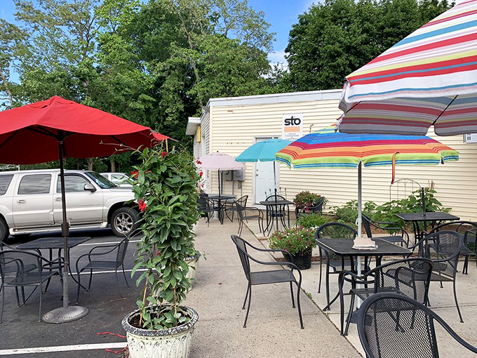 The outdoor seating area, with its colorful umbrellas, offers a perfect spot to savor your waffle while contemplating life's sweetest moments.