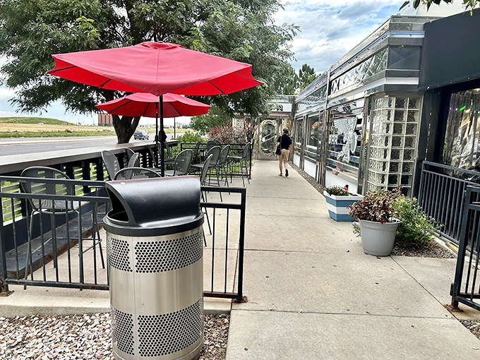 Outdoor dining with a side of Colorado's endless sky. Those red umbrellas don't just provide shade&mdash;they frame perfect moments of pancakes and people-watching.