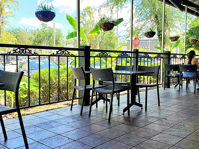 Outdoor seating surrounded by lush greenery &ndash; because the only thing better than great food is enjoying it in Florida's natural beauty.