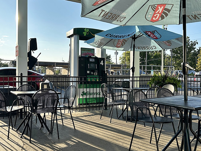 Where gas pumps once stood, outdoor dining now flourishes. The ghosts of Sinclair dinosaurs nod approvingly at this delicious evolution.