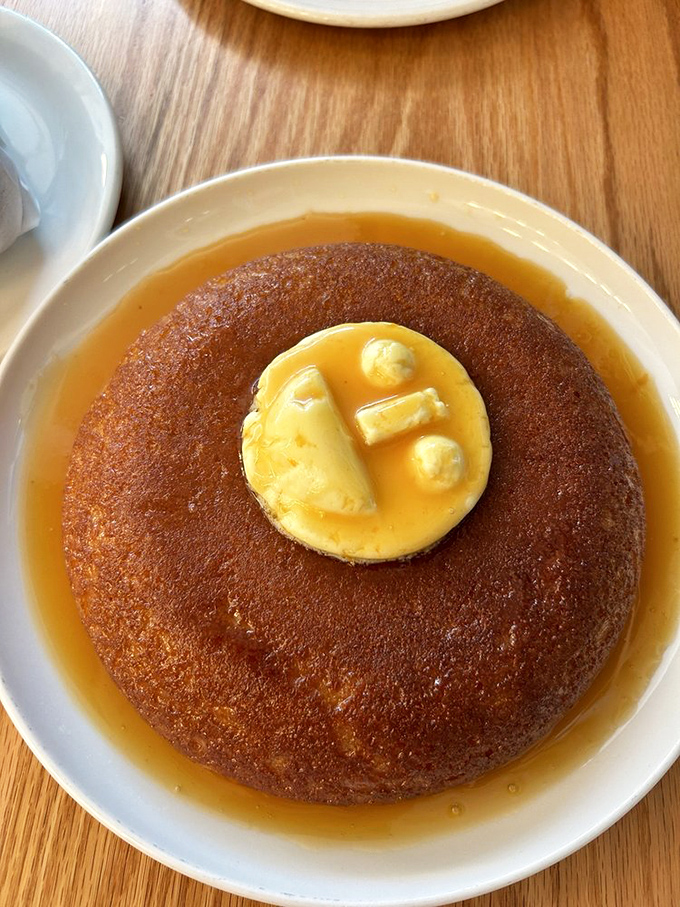 This isn't just a pancake&mdash;it's a golden disk of happiness, crowned with butter and swimming in syrup like it's living its best life. 
