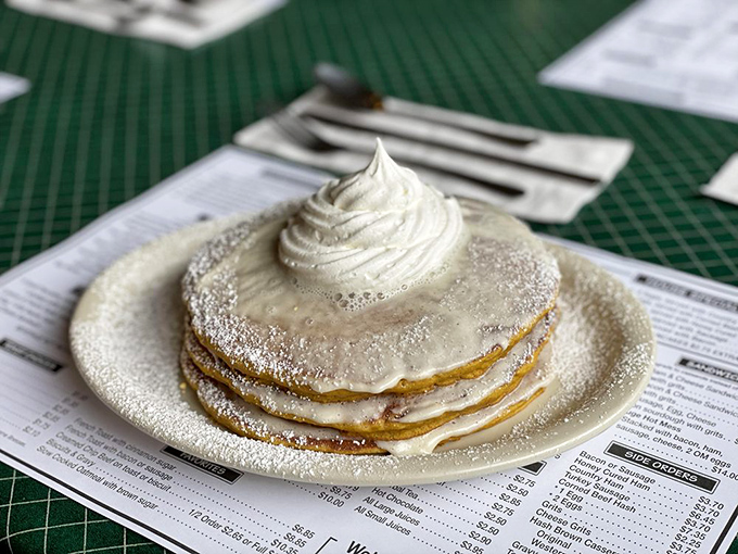 Pancakes crowned with whipped cream and dusted with powdered sugar. Breakfast or dessert? In this magical mountain haven, who says you can't have both?
