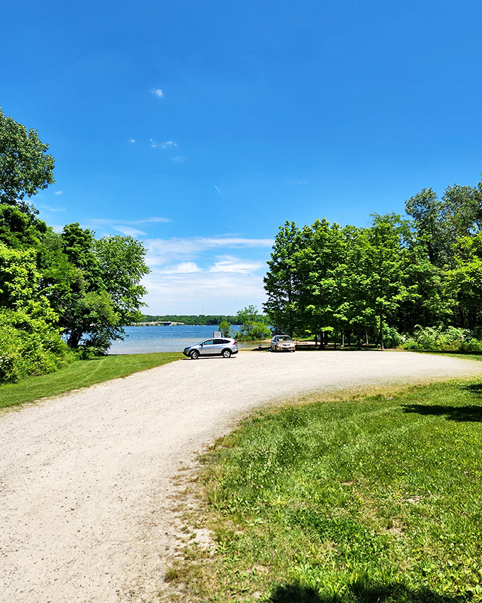 Paradise parking. This simple gravel lot is actually the gateway to countless adventures—proof that the best destinations often have the humblest entrances.