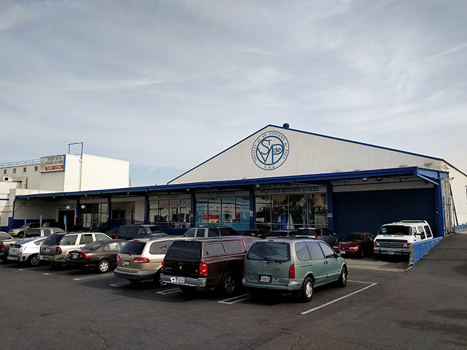 The distinctive blue-trimmed building stands as a landmark for bargain hunters and charitable shoppers alike&mdash;a community institution disguised as a simple thrift store.