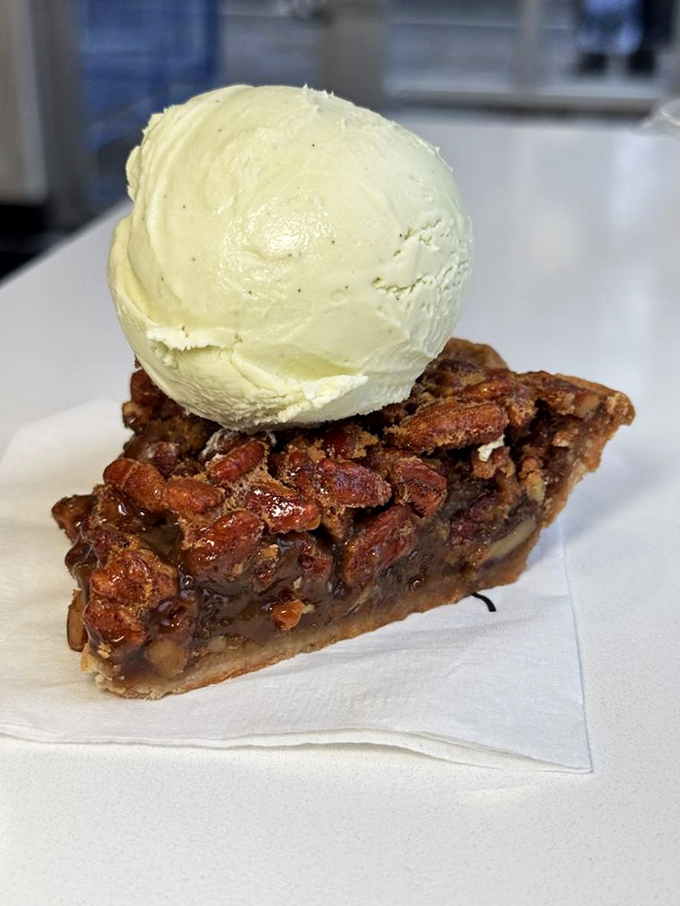 Pecan pie &agrave; la mode&mdash;where Southern comfort meets New York sophistication. That scoop is melting with anticipation, and so am I.