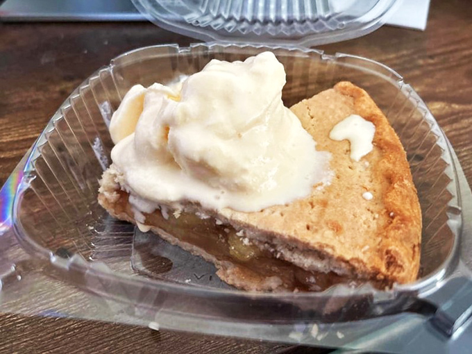 The finale that makes you glad you saved room. This humble slice of pie topped with ice cream proves J.D.'s excellence extends beyond the chicken coop.