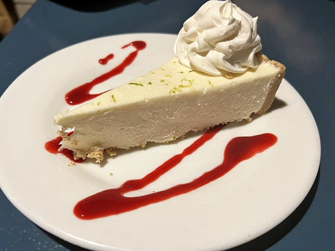Key lime pie that strikes the perfect sweet-tart balance, artfully plated with raspberry coulis&mdash;the dessert equivalent of a standing ovation.