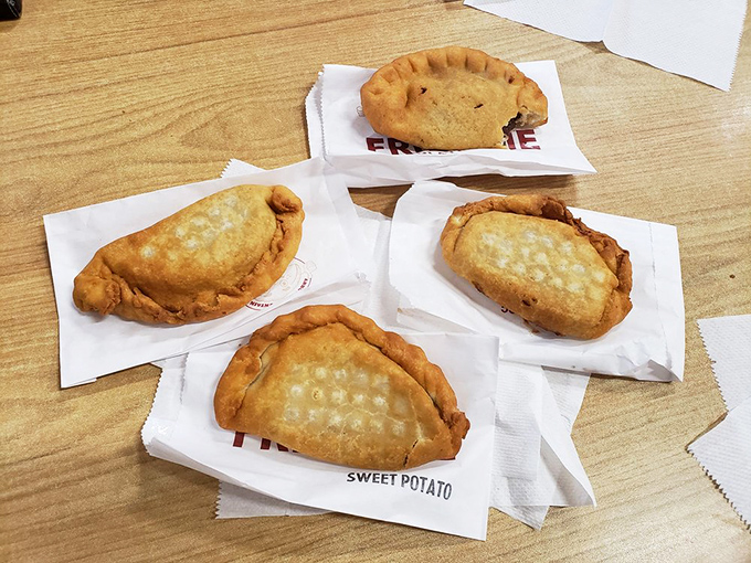 The family portrait&mdash;four golden pies waiting for adoption. That sweet potato one is practically begging to come home with you.