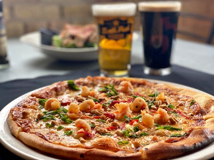 Pizza perfection happens at 500 degrees on granite slabs &ndash; this Thai shrimp masterpiece proves that brewing isn't the only craft they've mastered here.