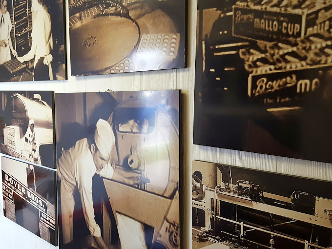 Black and white production photos adorn the walls like a candy hall of fame, chronicling the sweet science behind Boyer's beloved creations.