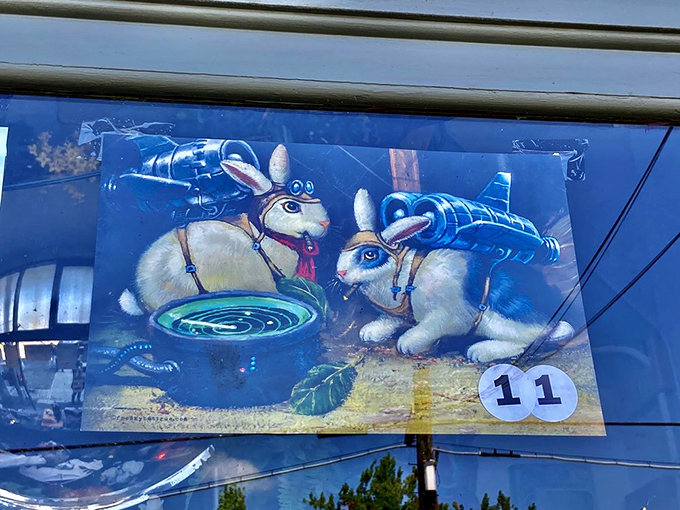 Space bunnies with helmets investigate a mysterious portal. This whimsical artwork perfectly captures the Peculiarium's blend of cute and creepy.