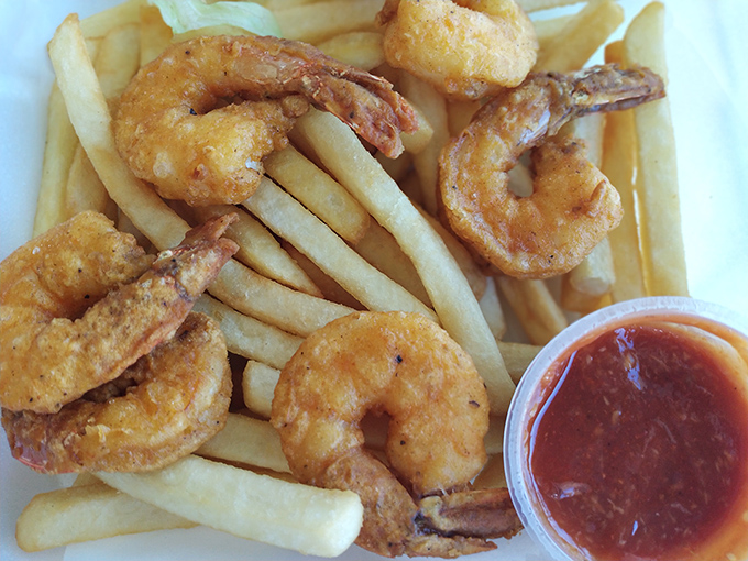 Crispy shrimp nestled among golden fries &ndash; proof that Kings knows its way around a fryer, regardless of what's taking the plunge.