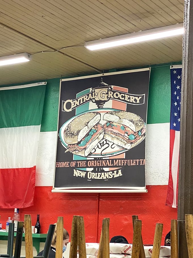 The Italian and American flags flank the sandwich hero poster like it's being inducted into a delicious hall of fame&mdash;which, let's be honest, it deserves.