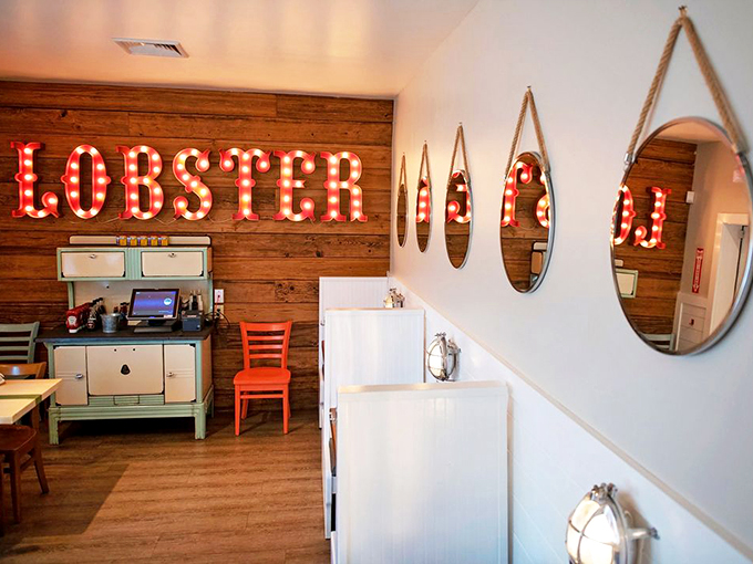 That illuminated LOBSTER sign isn't just decor &ndash; it's a beacon calling to seafood lovers like a lighthouse guides ships to safe harbor.