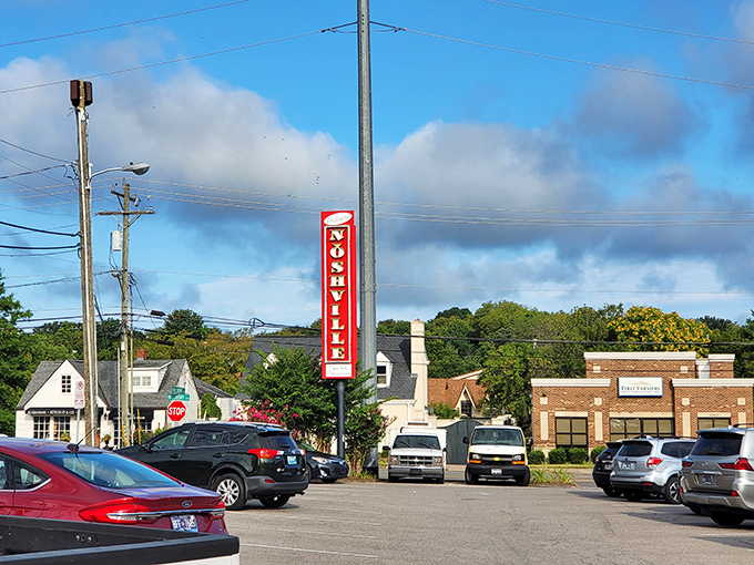 The vertical sign stands tall like a red-letter promise&mdash;inside this building, hunger doesn't stand a chance against generations of deli wisdom.