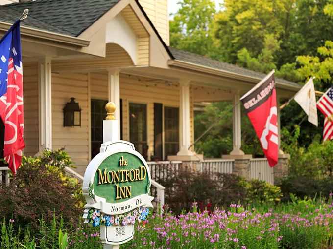 The Montford Inn sign, surrounded by wildflowers—your first clue that what lies beyond isn't just accommodation, but an experience worth remembering.