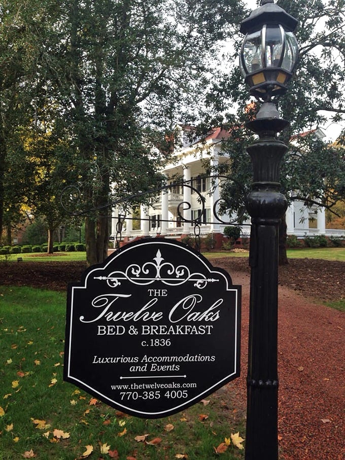 The sign that promises everything you've been dreaming of. Classic, elegant, and just waiting for you to turn down that oak-lined drive.