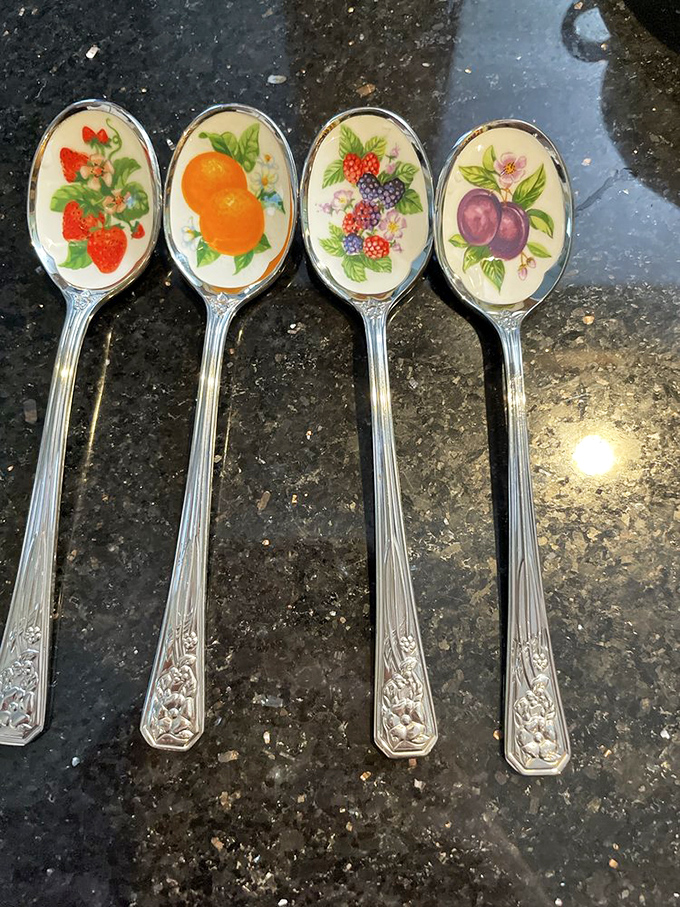 Fruit-adorned silver spoons that turn ordinary dessert into an occasion. Someone's cherished collection now awaits a new admirer to continue the tradition.