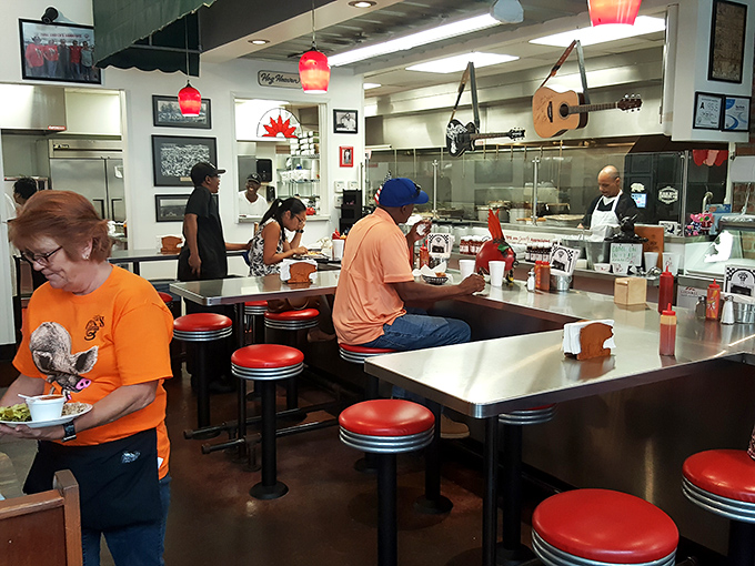 The counter experience &ndash; where regulars and first-timers alike watch barbecue masters work their magic behind a row of gleaming red stools.