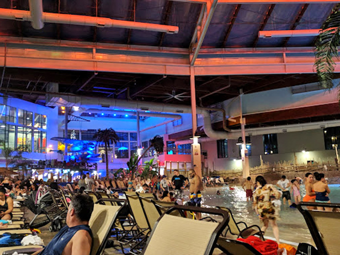 Evening at Aquatopia transforms the atmosphere with colorful lighting that makes every splash feel like part of an aquatic light show.