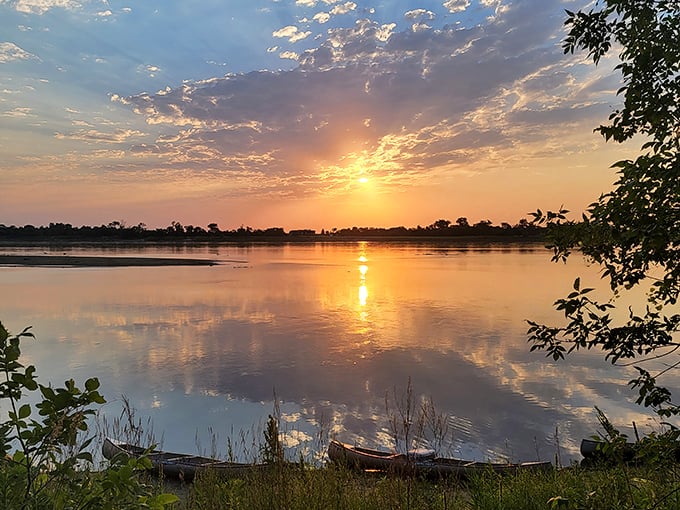 Three visitors discover the simple joy of sitting still. Sometimes the best vacation activity is simply watching the river flow by. 