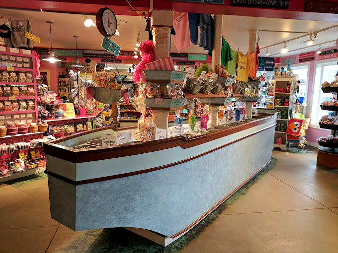 The nautical-themed counter, shaped like a boat, perfectly captures Cannon Beach's coastal charm while navigating customers through a sea of sweetness.