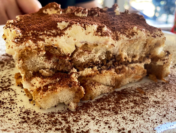 Tiramisu that strikes the perfect balance between coffee, cream, and cocoa. The dessert equivalent of a standing ovation.