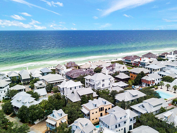 From above, Rosemary Beach reveals itself as a perfectly planned paradise where white rooftops reflect the sun and everyone's mortgage is higher than yours.