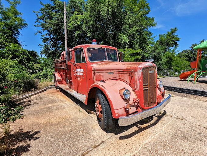 This vintage fire truck stands as a monument to Americana, the kind of random roadside attraction that makes cross-country road trips memorable.