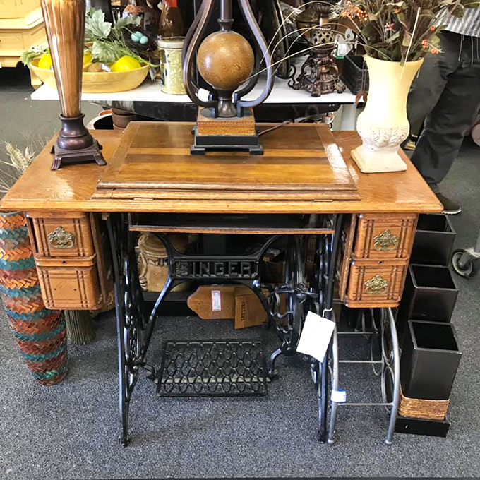 This Singer sewing table stands as a monument to craftsmanship from when things were built to last generations, not just until the next software update.