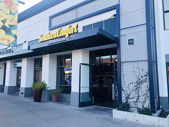 The unassuming exterior of Southern Comfort Kitchen hides culinary treasures within, like finding a jazz club in a phone booth.