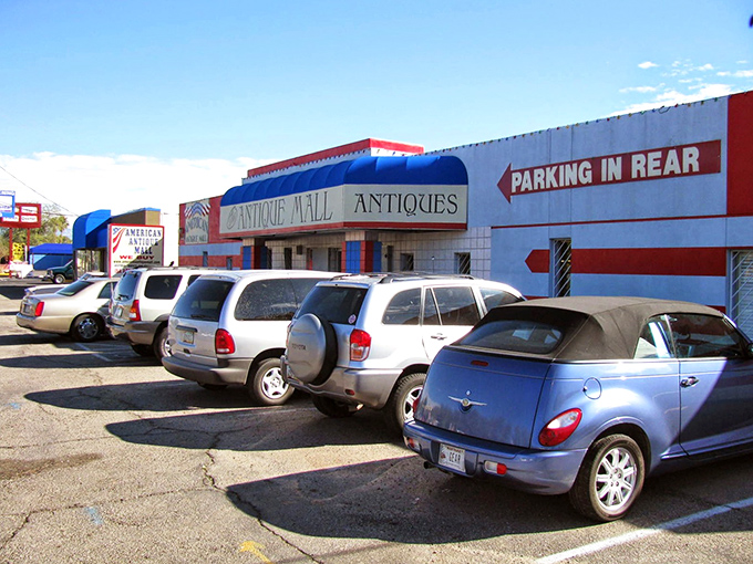 The American Antique Mall's vibrant blue awning stands out like a desert oasis for treasure hunters. Parking in the rear means more room for hauling home your vintage finds!