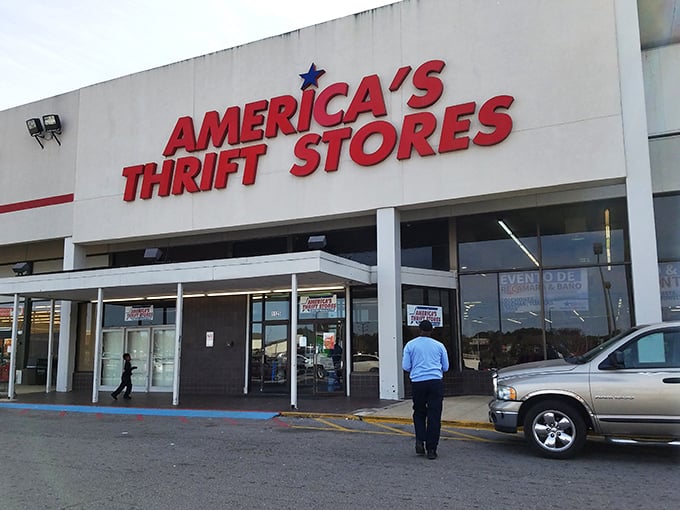 The bold red sign of America's Thrift Store beckons like a bargain lighthouse. Treasure hunters, your quest begins here!