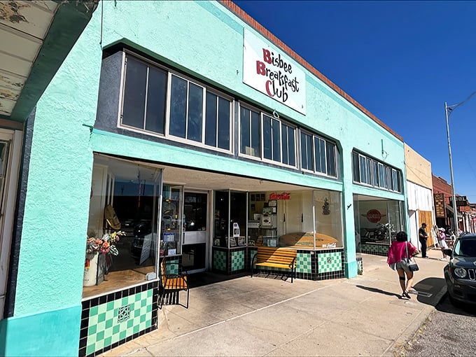 The mint-green facade of Bisbee Breakfast Club stands as a cheerful beacon of morning deliciousness in this historic mining town.