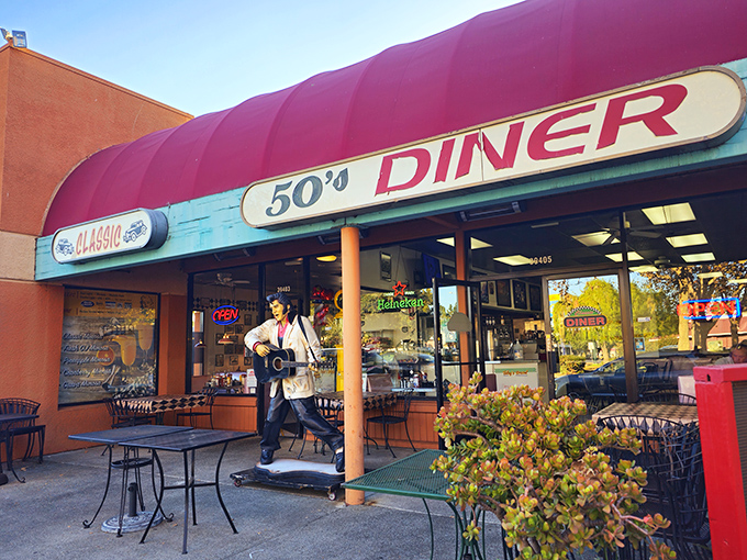 The Classic 50's Diner's cherry-red awning isn't just eye-catching&mdash;it's a time portal to when Elvis was king and milkshakes came with the metal mixing cup.