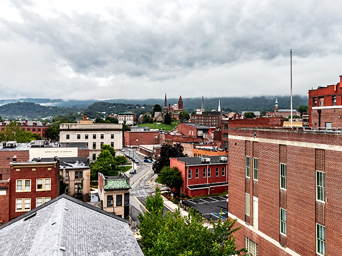 Cumberland's skyline unfolds like a history book with pages of brick and steeple, nestled against misty mountains.