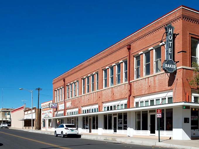 Historic Hotel Baker stands proudly against the blue New Mexico sky, a brick sentinel that's witnessed generations of Deming life unfold.