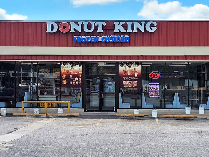 The red kingdom where dough becomes royalty. Donut King's storefront promises sweet treasures that are worth every calorie.