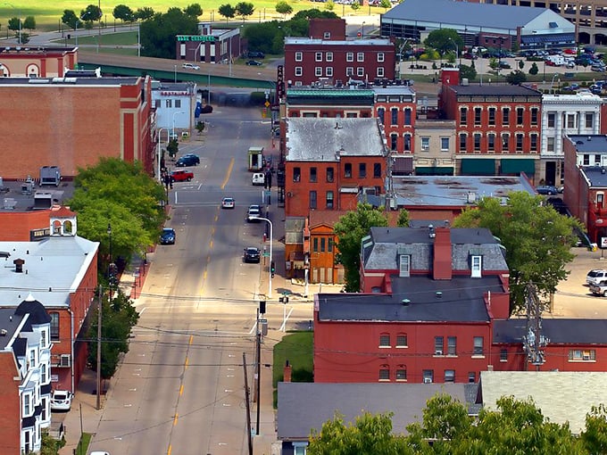 Downtown Dubuque stretches out like a red-brick welcome mat. History and charm on full display without the big-city price tag!