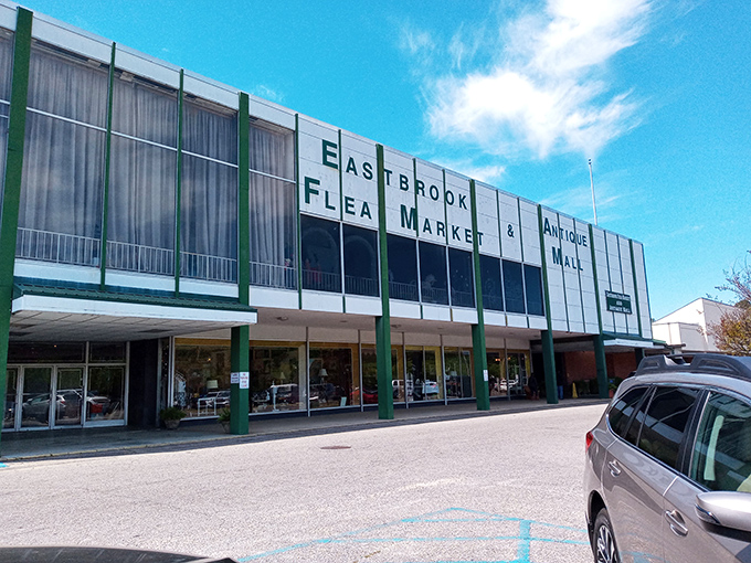 The retro facade of Eastbrook Flea Market stands like a time portal to bargain paradise&mdash;architectural proof that treasure hunting never goes out of style.