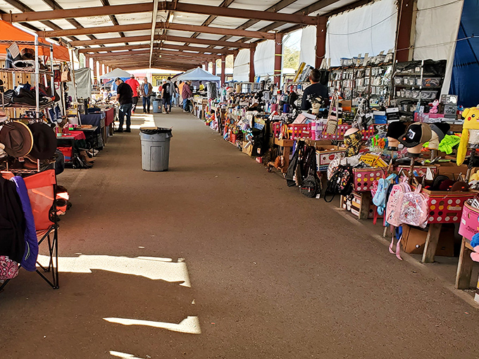 Long aisles of possibility! Every booth at Menge Flea Market holds someone's past treasure waiting to become your future conversation piece 