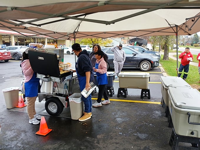 Garcia's mobile setup might be simple, but those grills are where hot dog dreams come true. Street food at its finest!