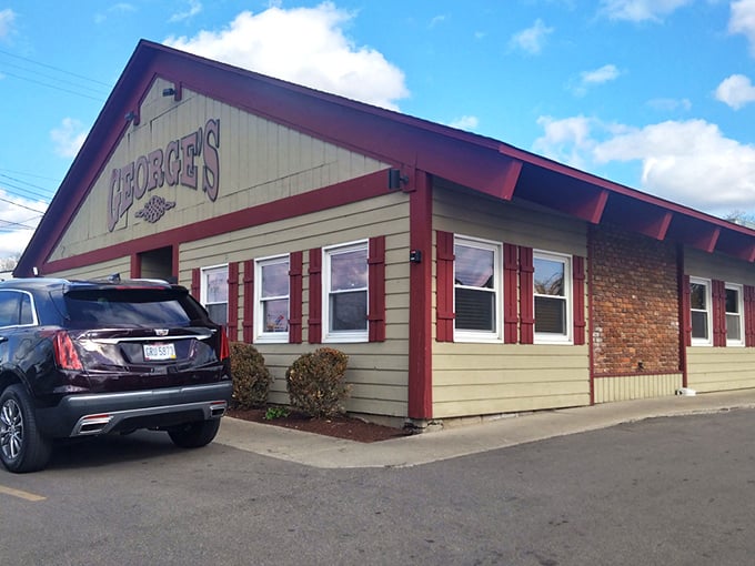 George's Family Restaurant: The tan building with red trim and purple sign promises comfort food that'll make you forget your diet resolutions in record time.