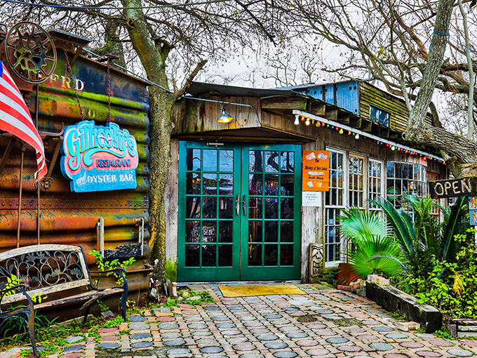 Gilhooley's exterior looks like a pirate's hideout that accidentally got a restaurant license. Rustic corrugated metal meets Gulf Coast charm.