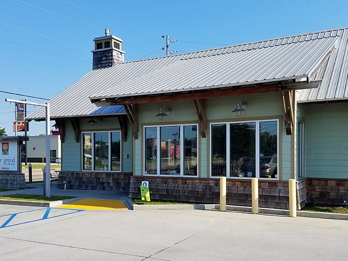 Grind Coffee & Nosh's charming exterior promises comfort the moment you arrive, like finding a cozy sweater on the first chilly day of fall.